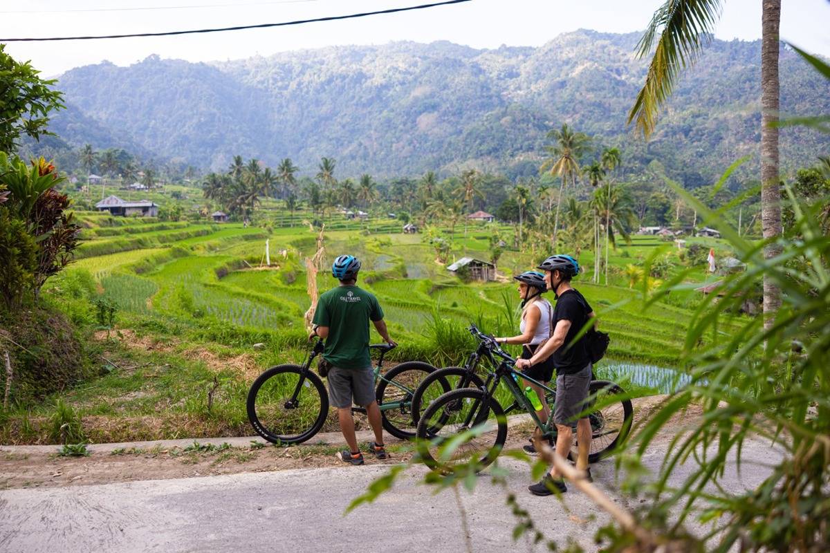 Enjoy a Cultural Day by Bike → Cycling Tour in Bali with Waterfall Dip ...
